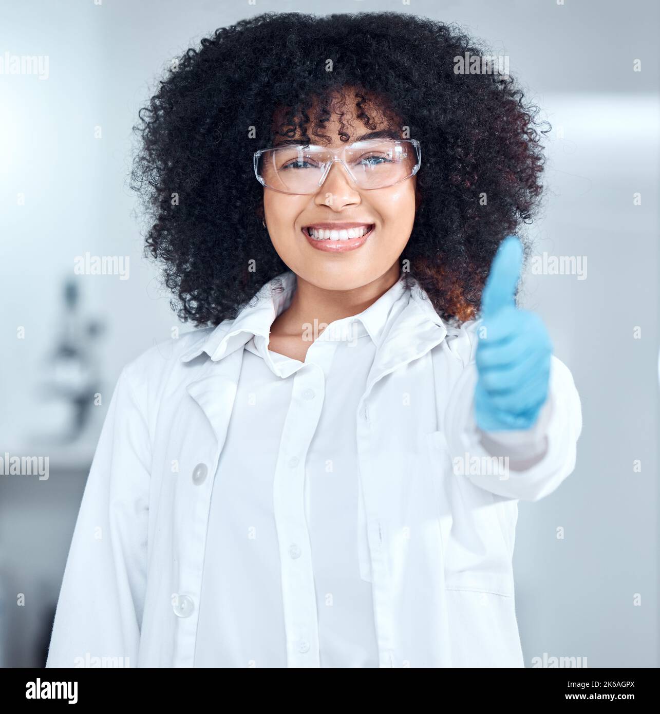 Portrait of a beautiful young african american woman with an afro ...