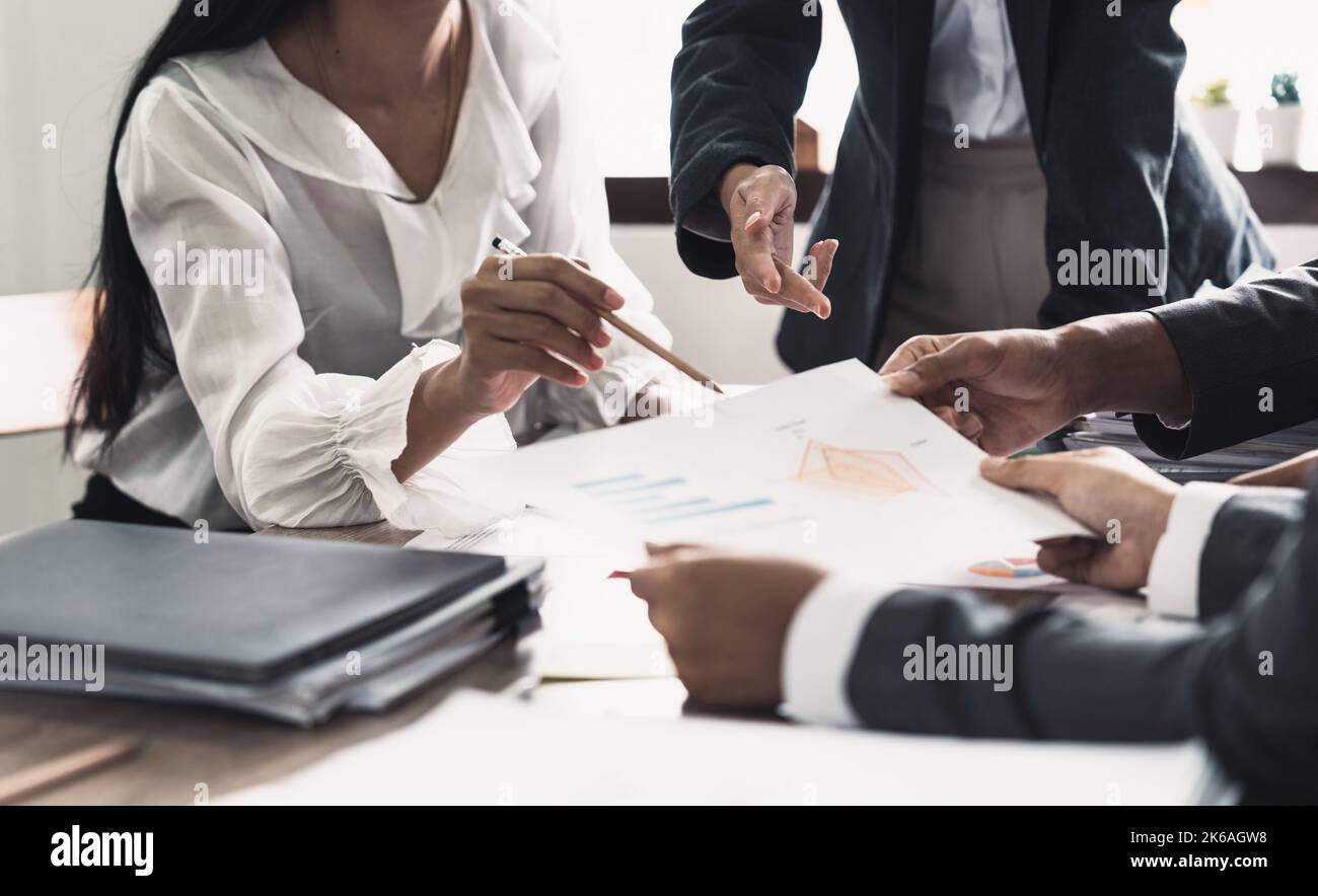 Business team collaboration discussing analyzing with financial data ...