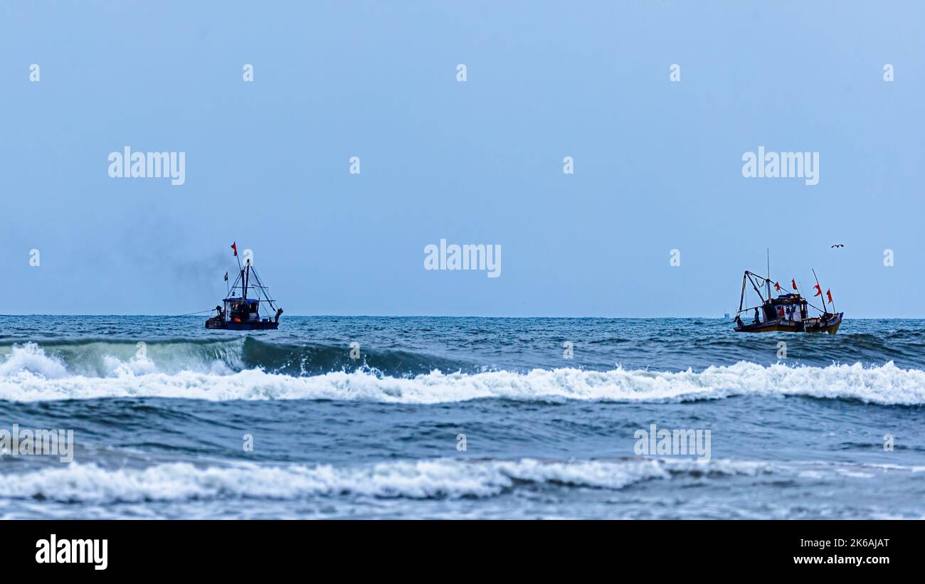 Fishing Ships sailing in sea for catching fish 3 Stock Photo - Alamy