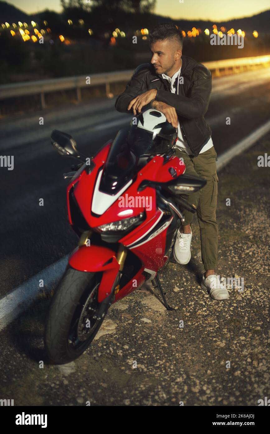 Red and black motor bike hi-res stock photography and images - Alamy