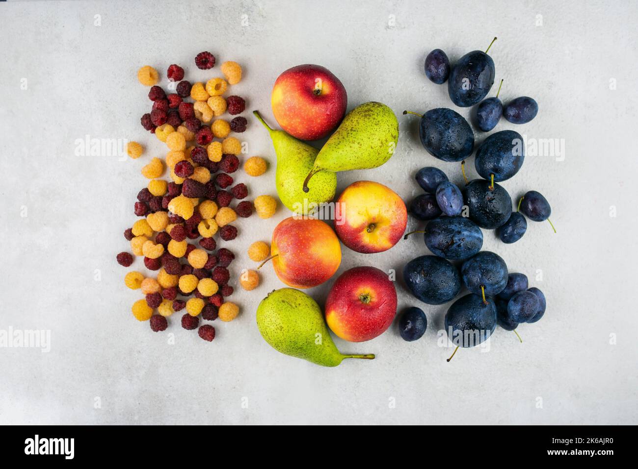 A closeup of different types of fruits in white background Stock Photo ...