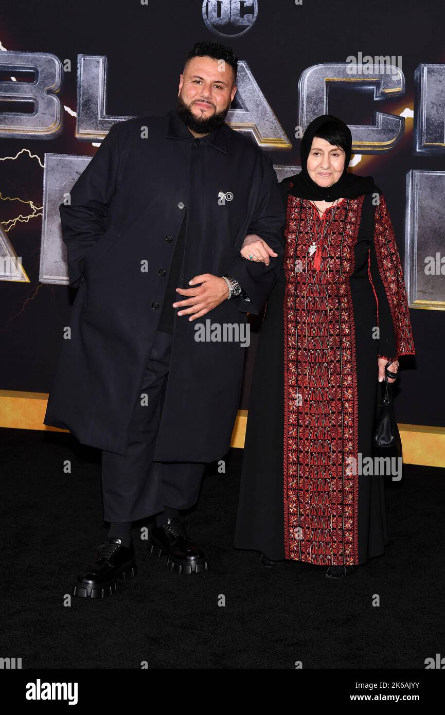 Mohammed Amer (l) and his mother attend the “Black Adam” premiere in ...