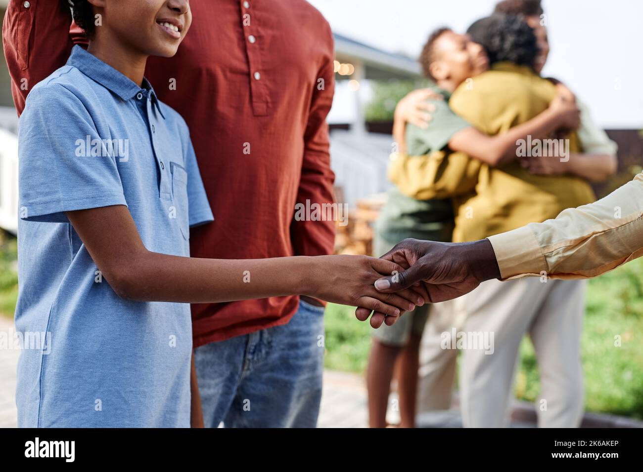 Child shaking hands hi-res stock photography and images - Alamy