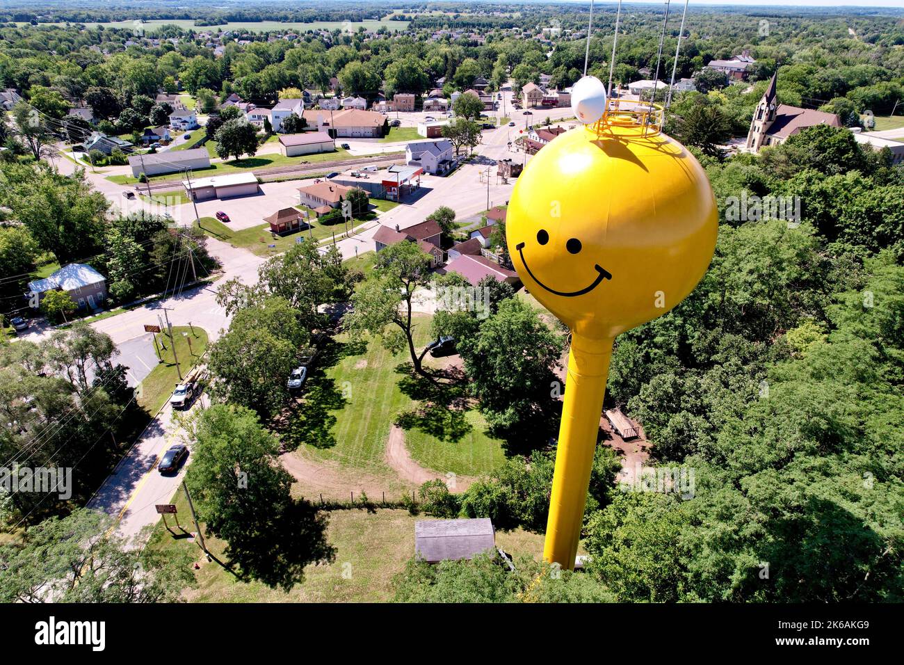 An aerial view of a yellow smiley face Water Tower, Illinois, United ...