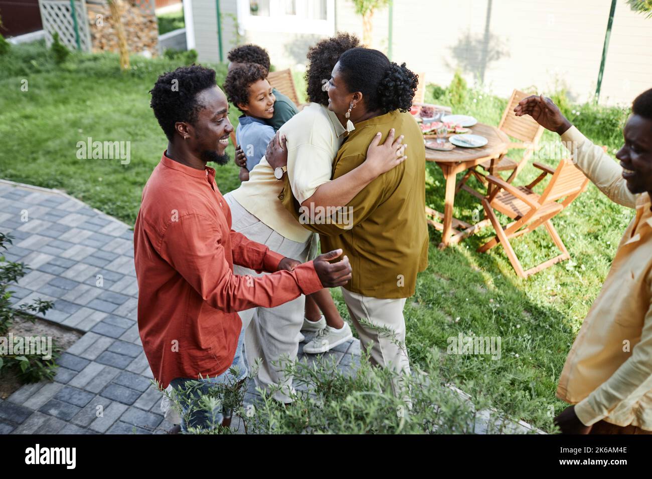 Big African American family enjoying gathering for Summer party ...