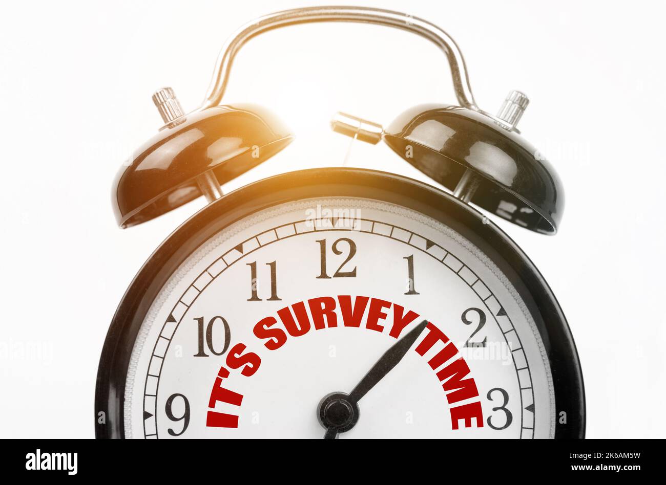 Finance and business concept. On the dial of the alarm clock the ...