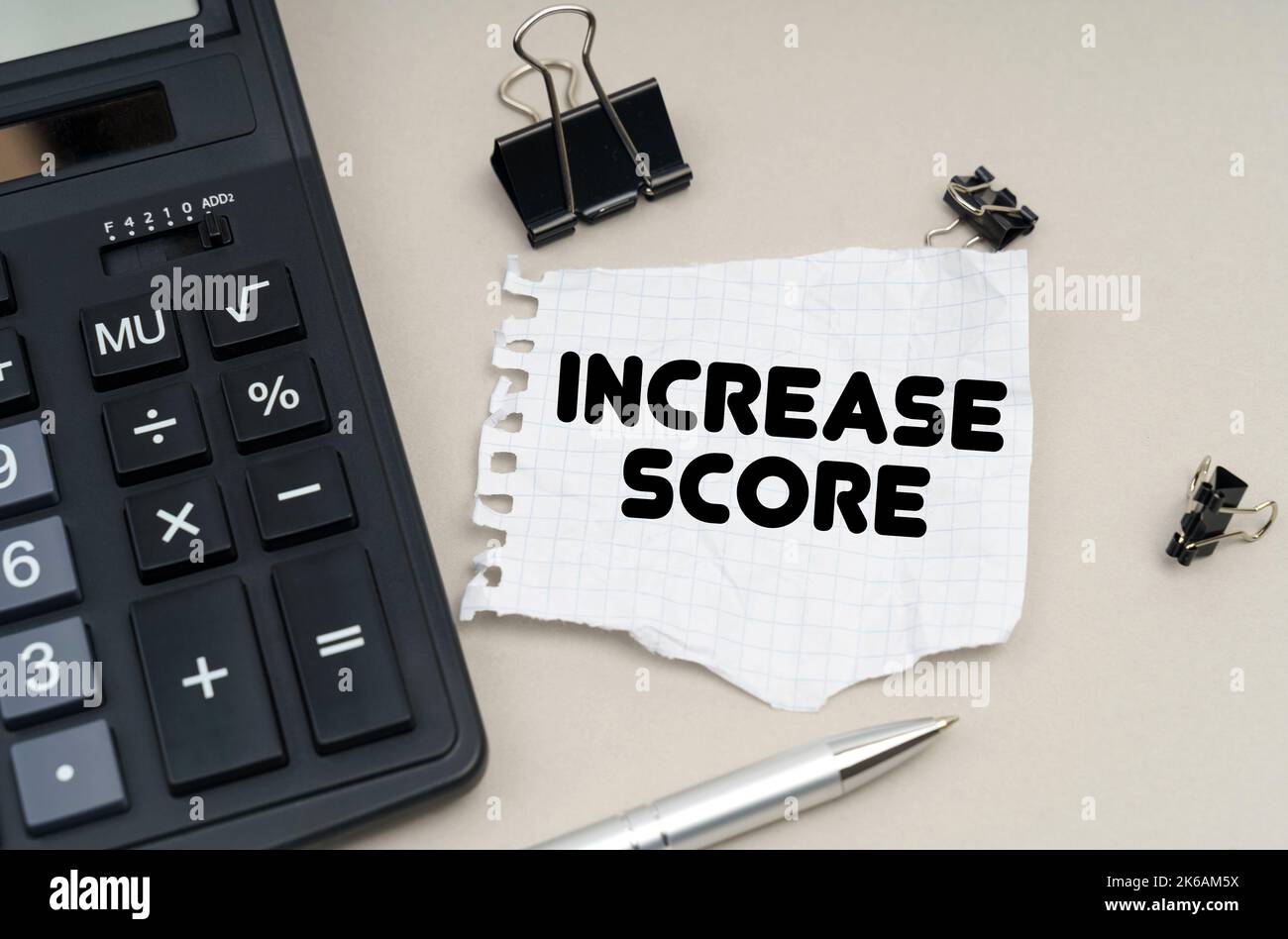 Business and finance concept. On the table is a calculator, a pen and ...