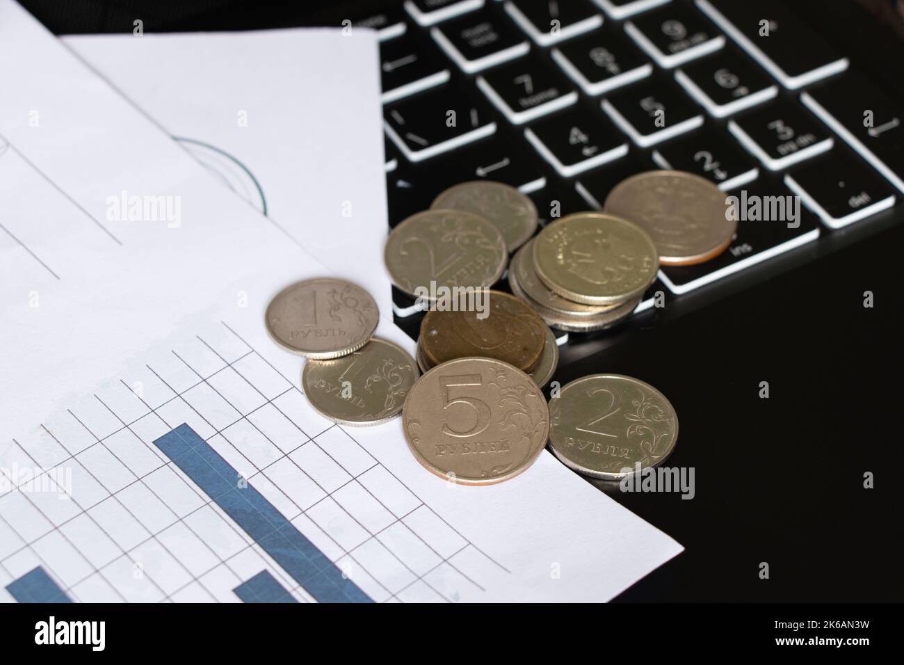 Russian rubles on black laptop keyboard. Financial sanctions against ...