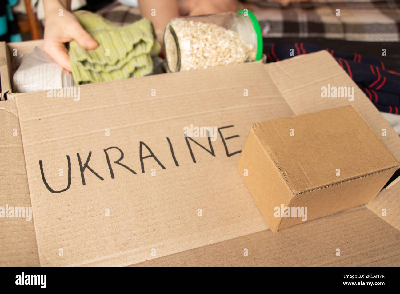 Collecting a humanitarian food set to help people who suffered during ...