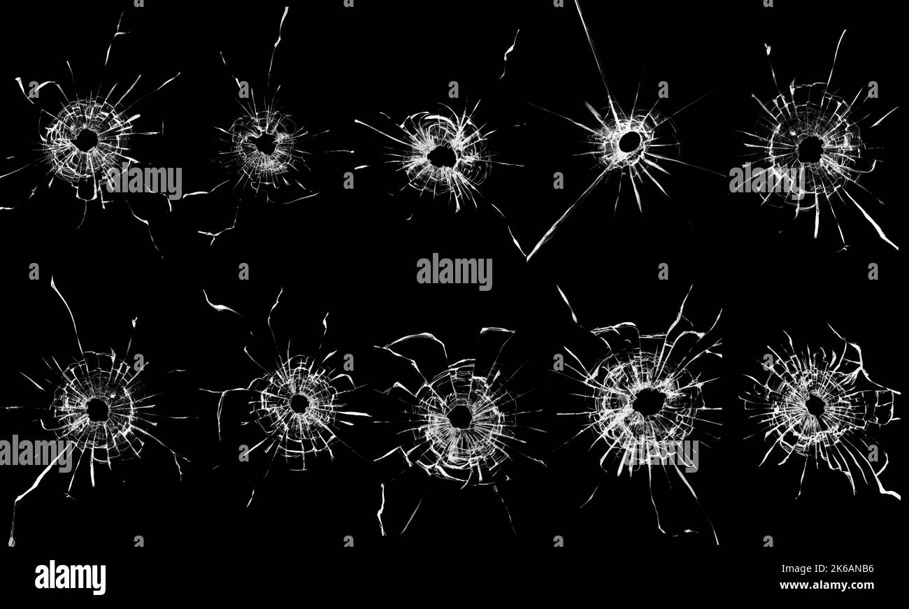A group of bullet holes on a glass window abstract background. Texture ...