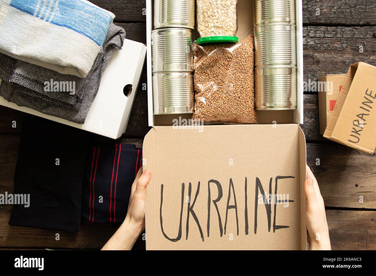 Collecting a humanitarian food set to help people who suffered during ...
