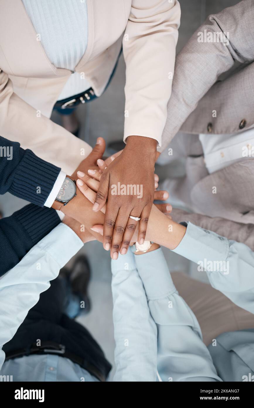 Hands, collaboration and solidarity with a team of business people ...