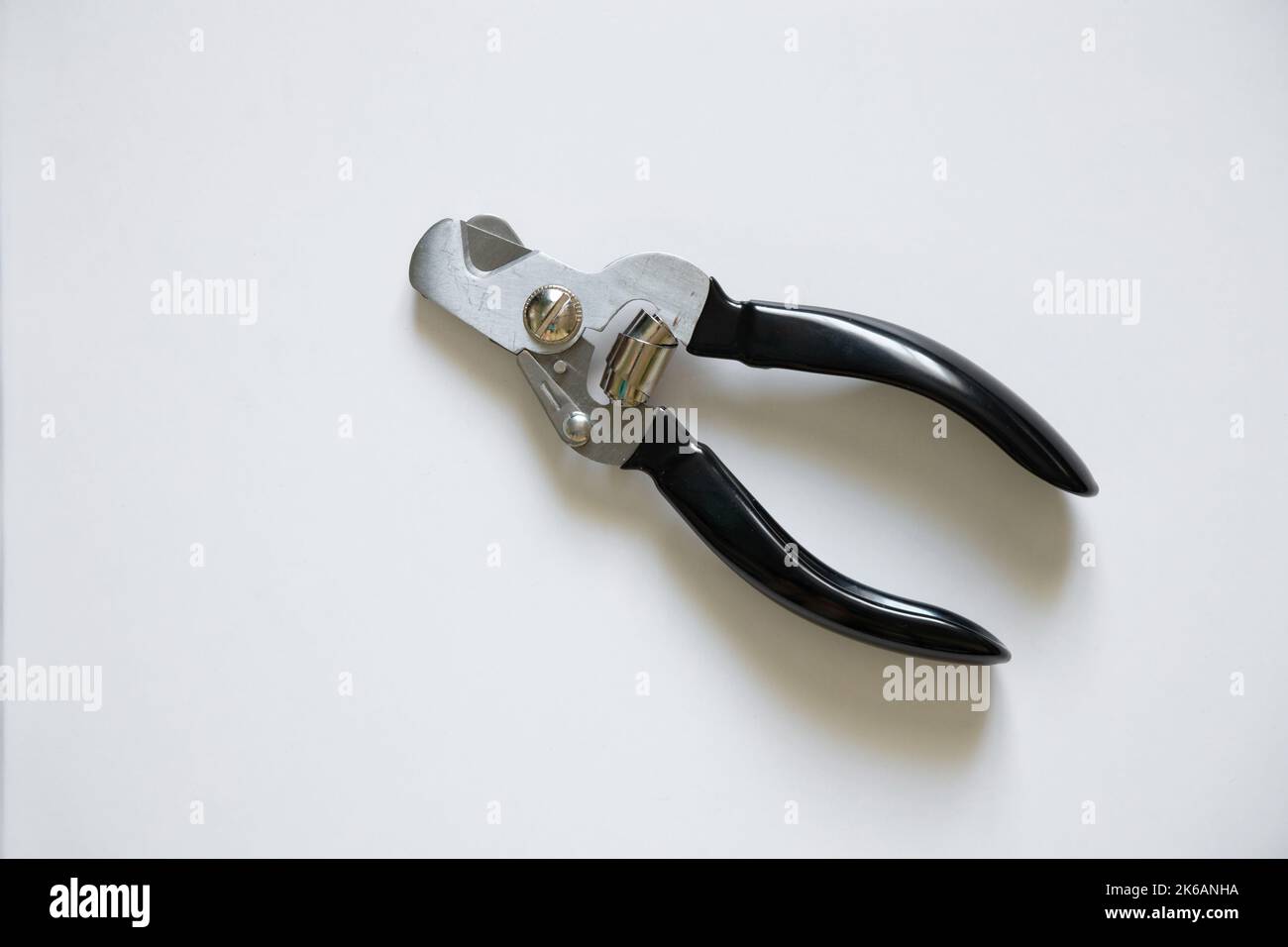 Scissors for trimming the claws of animals on a white background ...