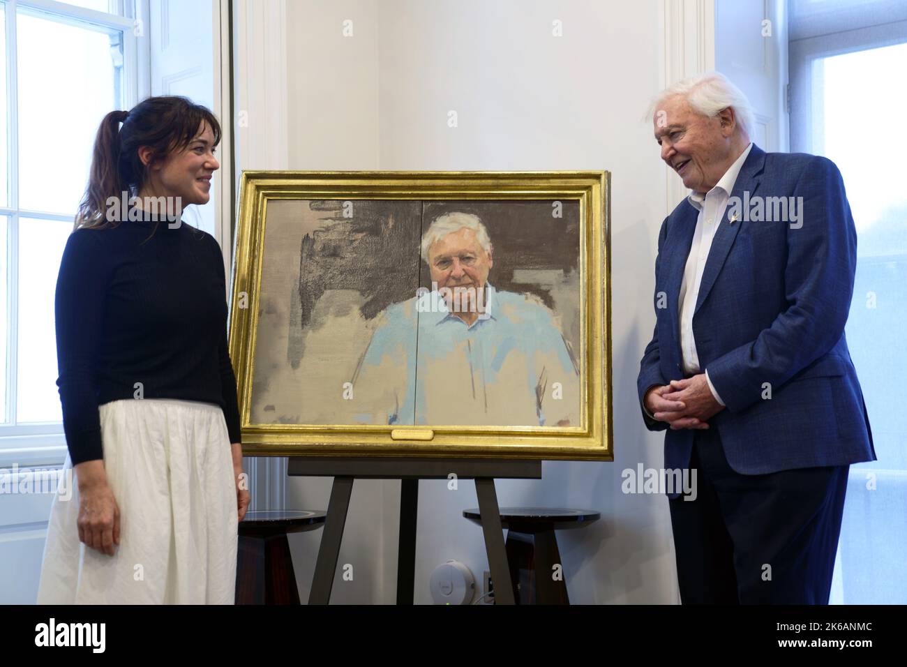 Sir David Attenborough stands with a new portrait of himself by ...