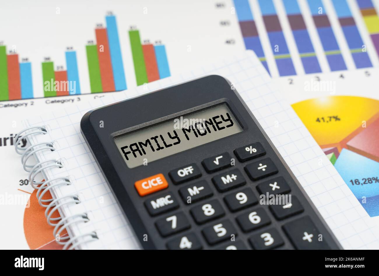 Business and economy concept. On the table are charts, a notebook and a ...