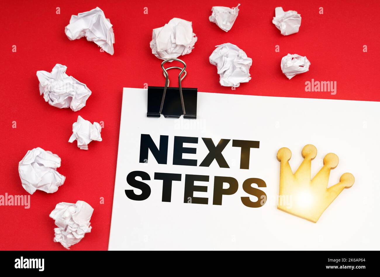 Business and finance concept. On a red background in crumpled paper and ...