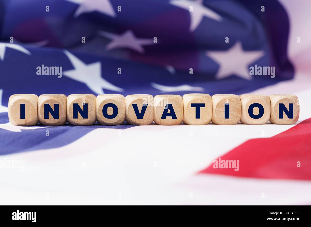 American economy and business concept. The US flag has cubes with the ...