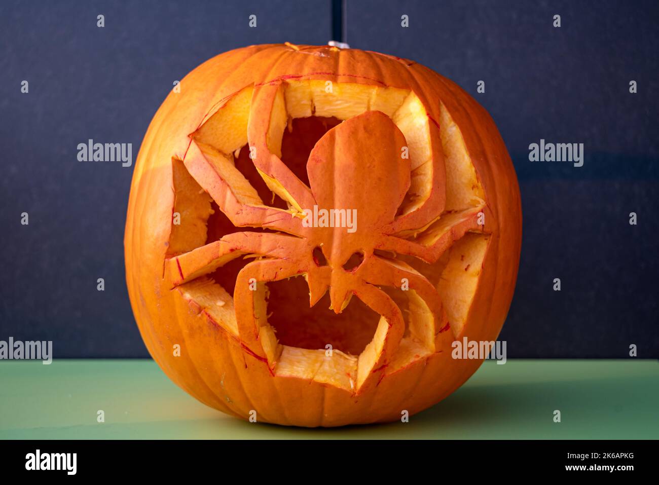 Halloween pumpkin with spider theme Stock Photo - Alamy