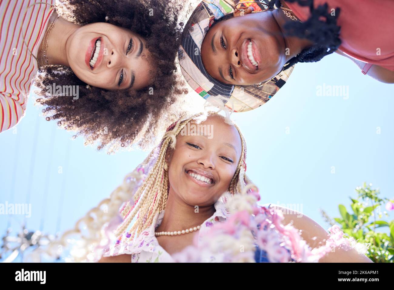Happy, smile and gen z friends huddle during holiday in summer in the ...