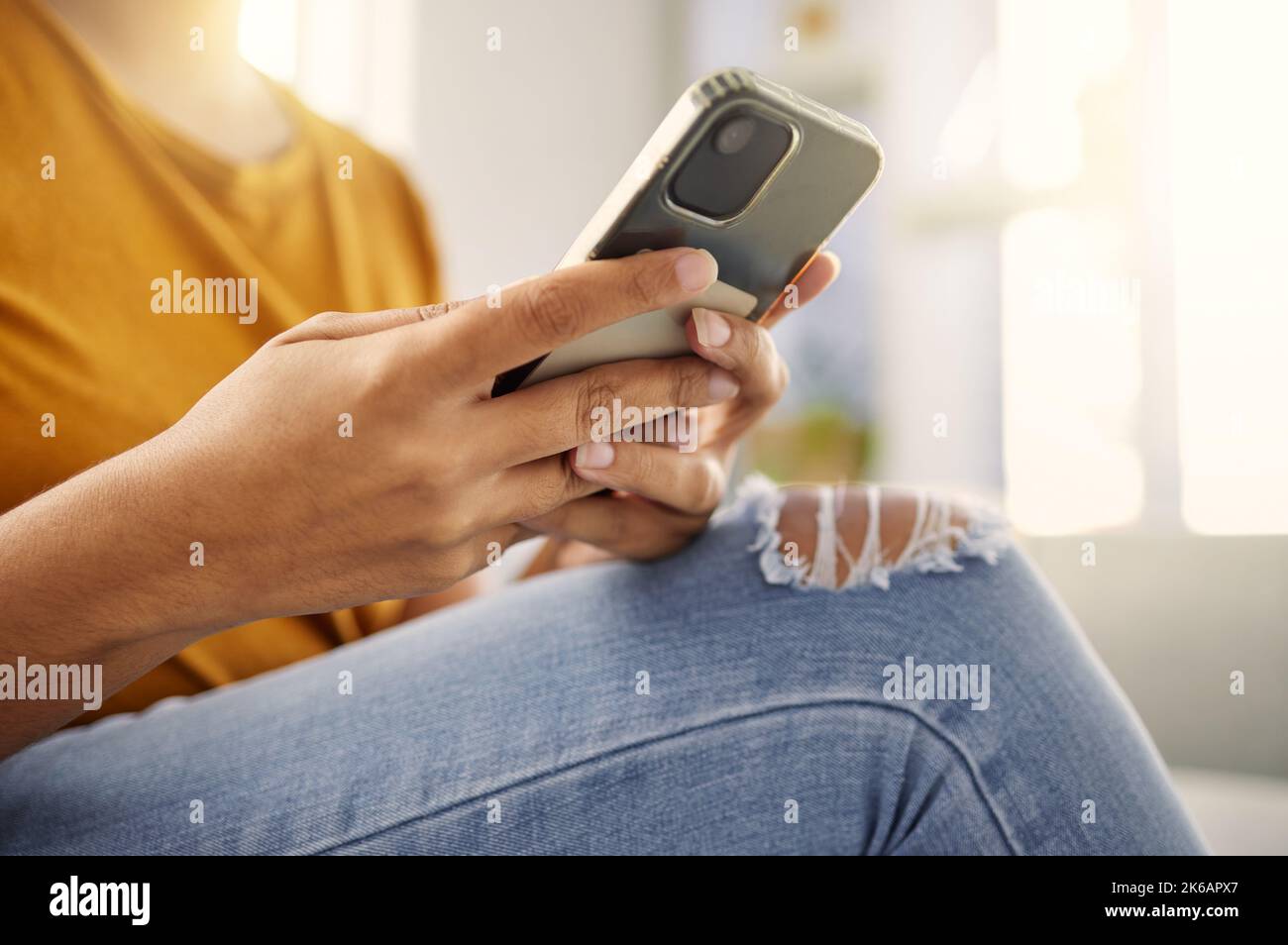 My phones got everything I need. an unrecognizable person using a phone ...