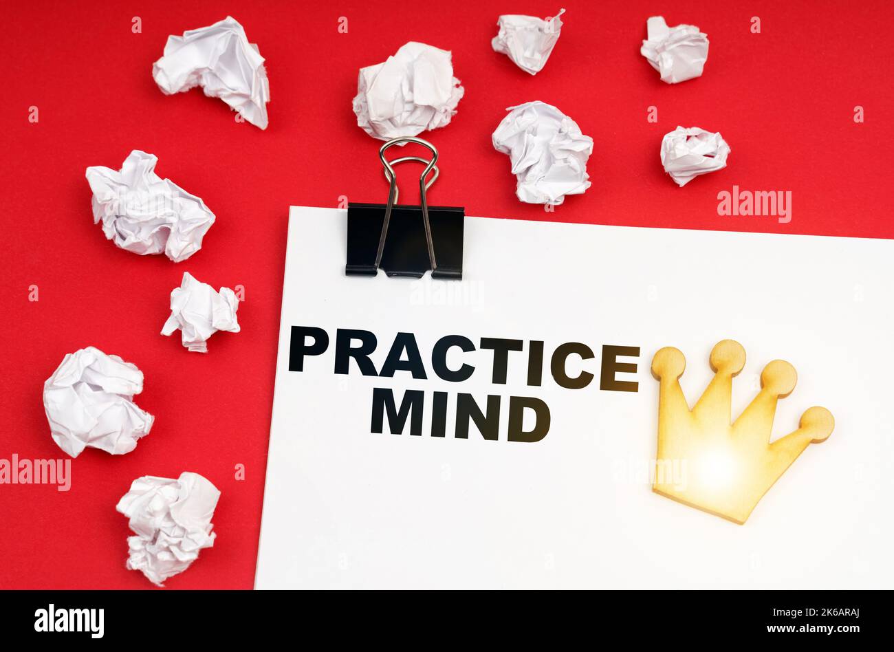 Business and finance concept. On a red background in crumpled paper and ...