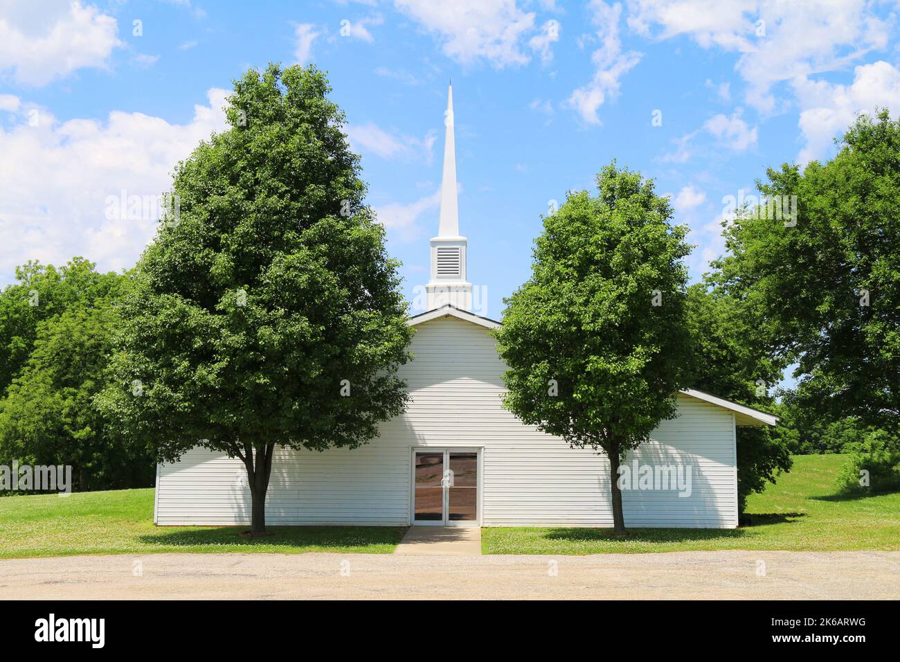 a rural chapel church worship empty white steeple tower cross god ...