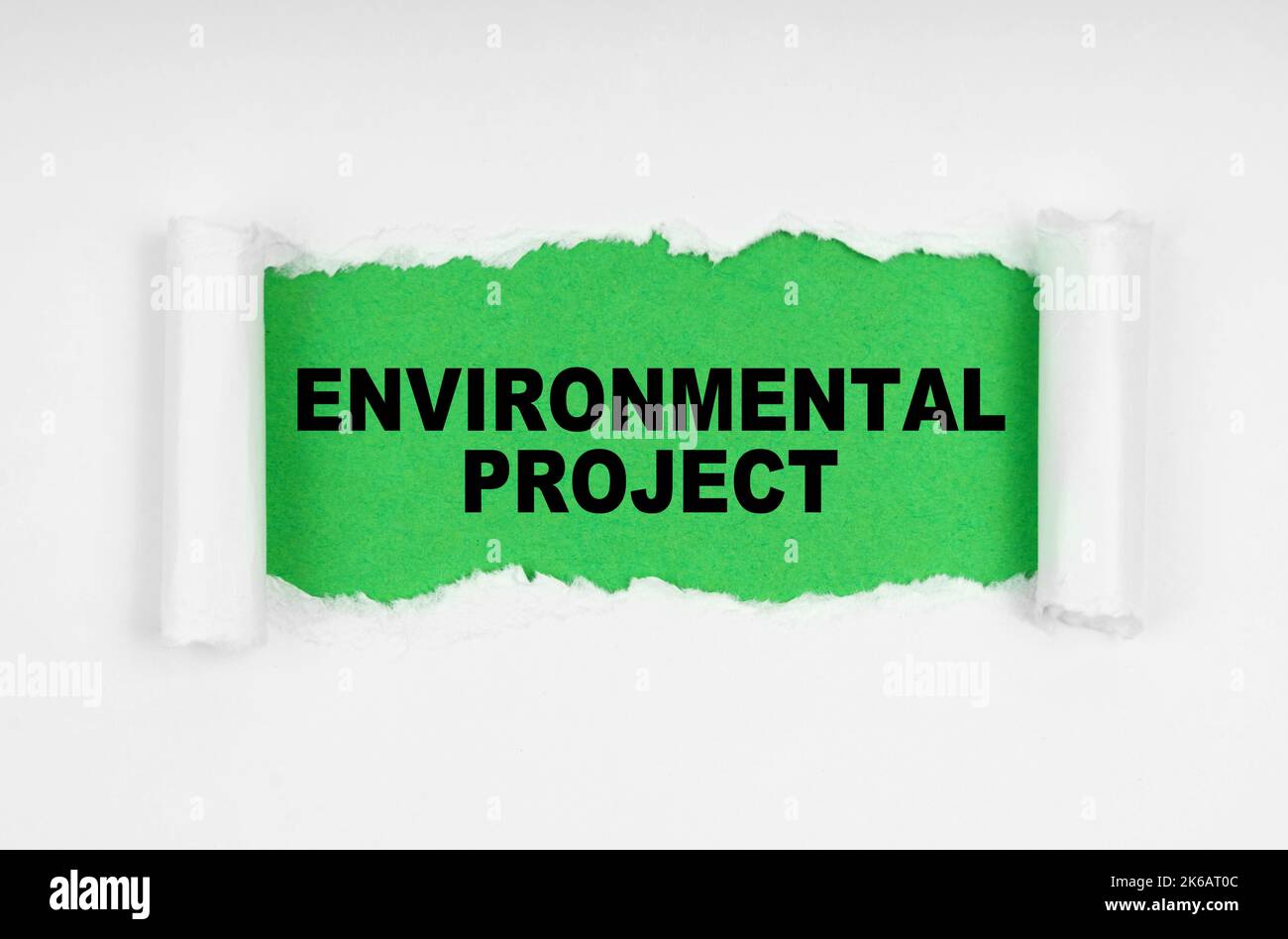 Environmental concept. In the middle of the white sheet, the paper is ...