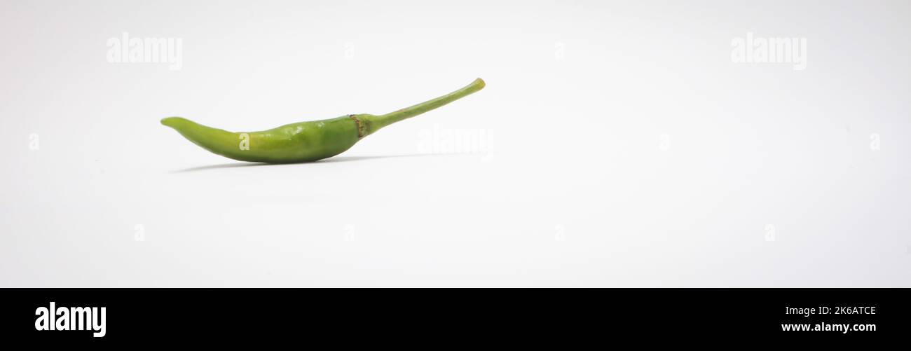 Green chili isolated on white background Stock Photo - Alamy