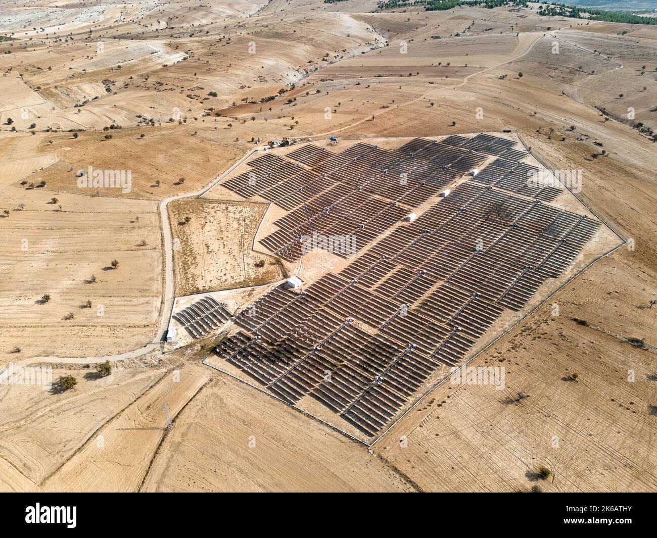 Solar panel field built on arid lands. Alternative green energy concept ...