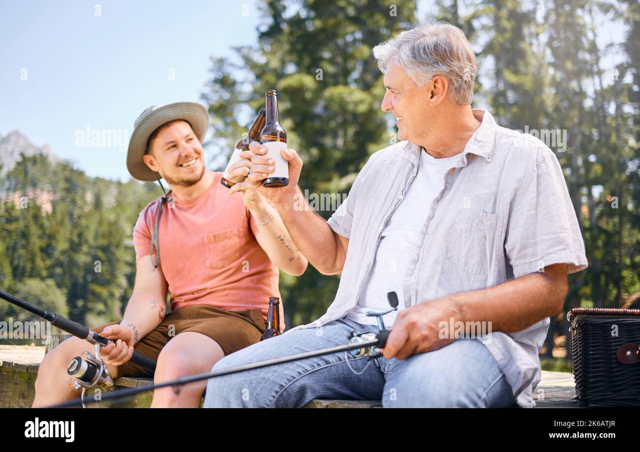 Cheers to a relaxing day together. a man drinking beer with his father ...