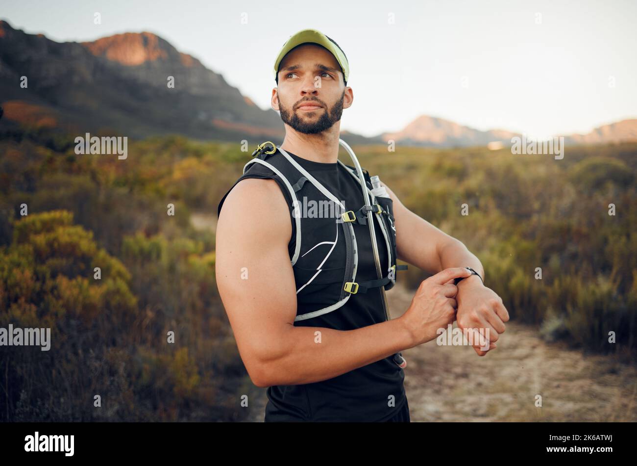 Fitness, man and smart watch time for mountain running, exercise ...