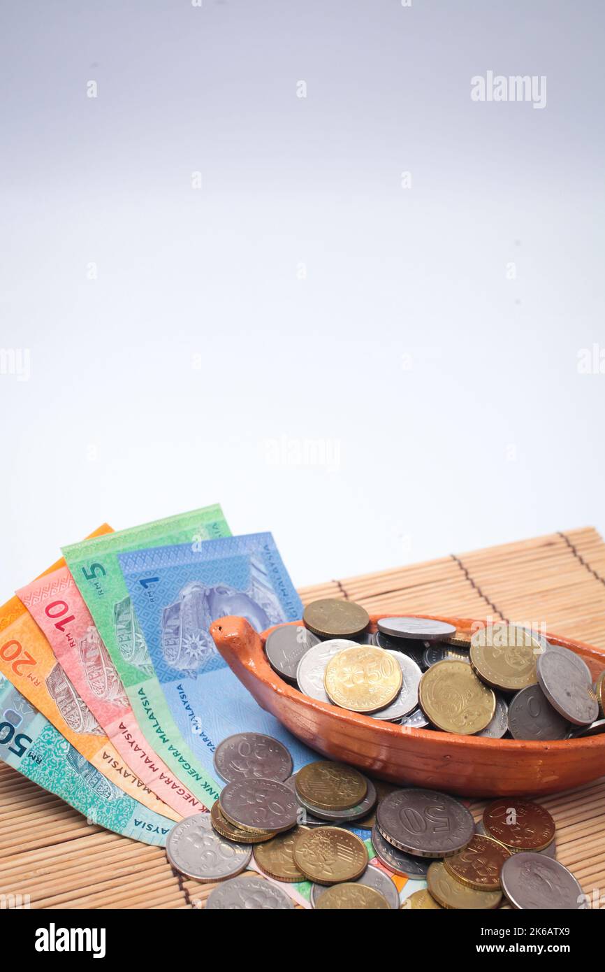 Malaysia Ringgit note and coins isolated on white background. Business ...