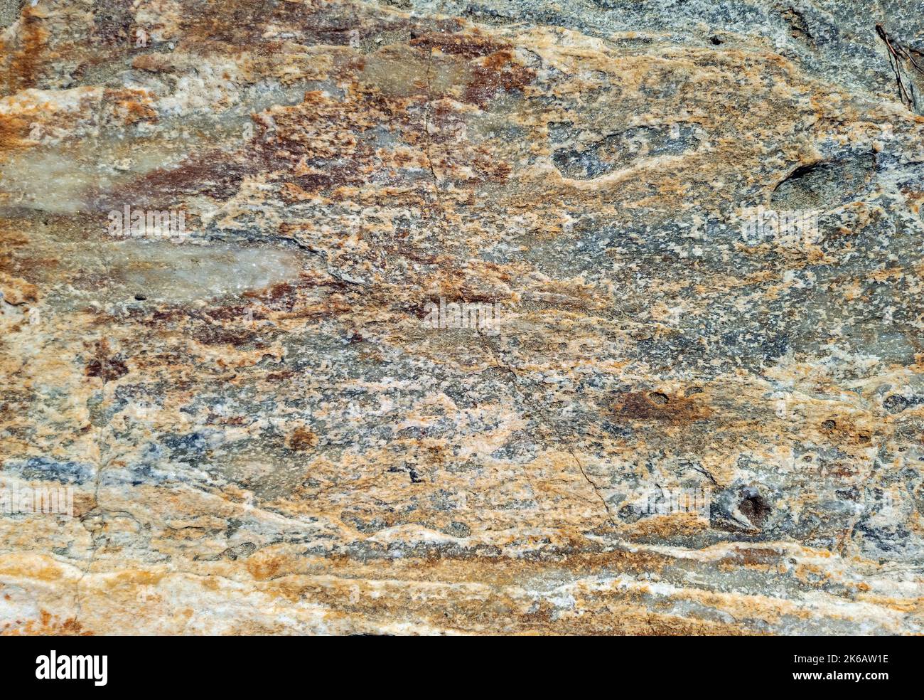 Grey brown stone wall background texture. Rocky cracked formation with ...