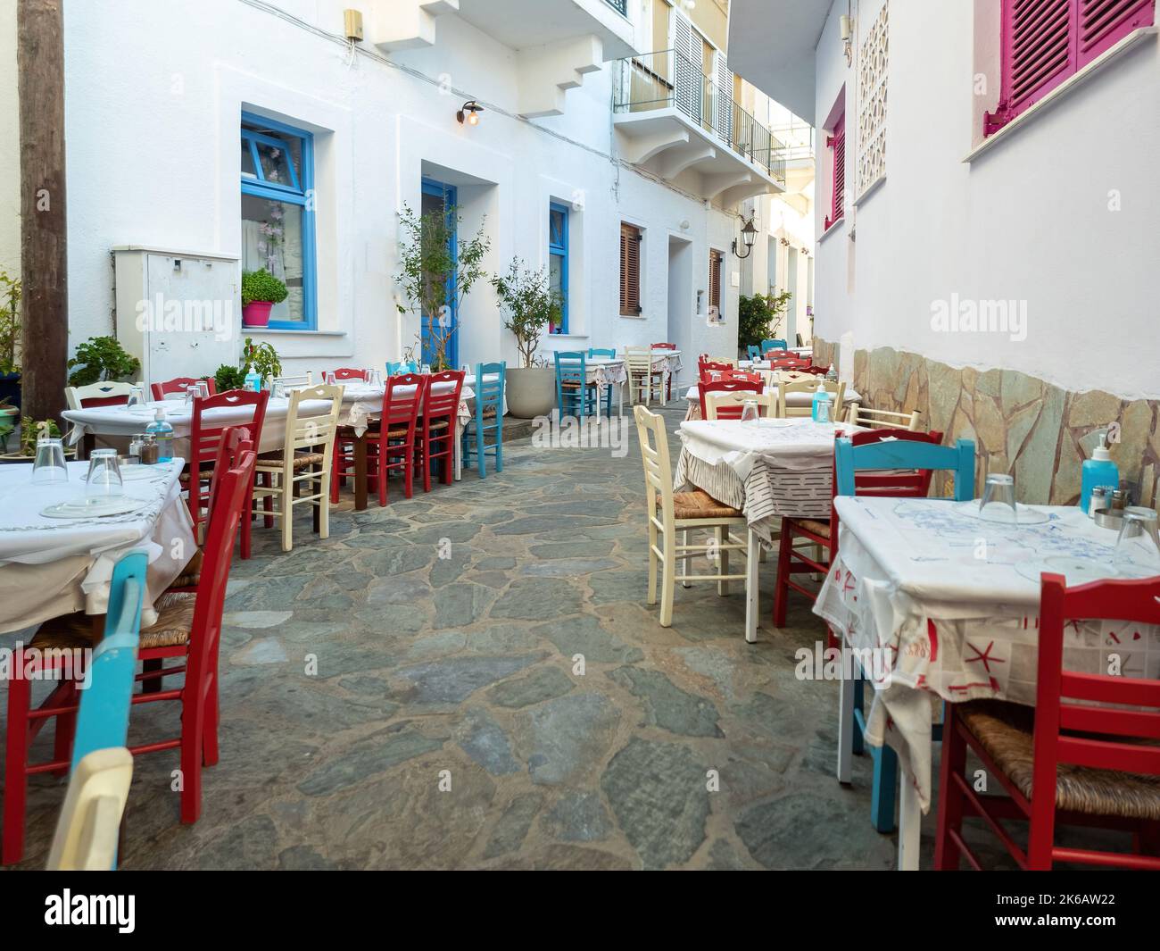 Greek outdoors tavern restaurant at Batsi village, Andros island ...