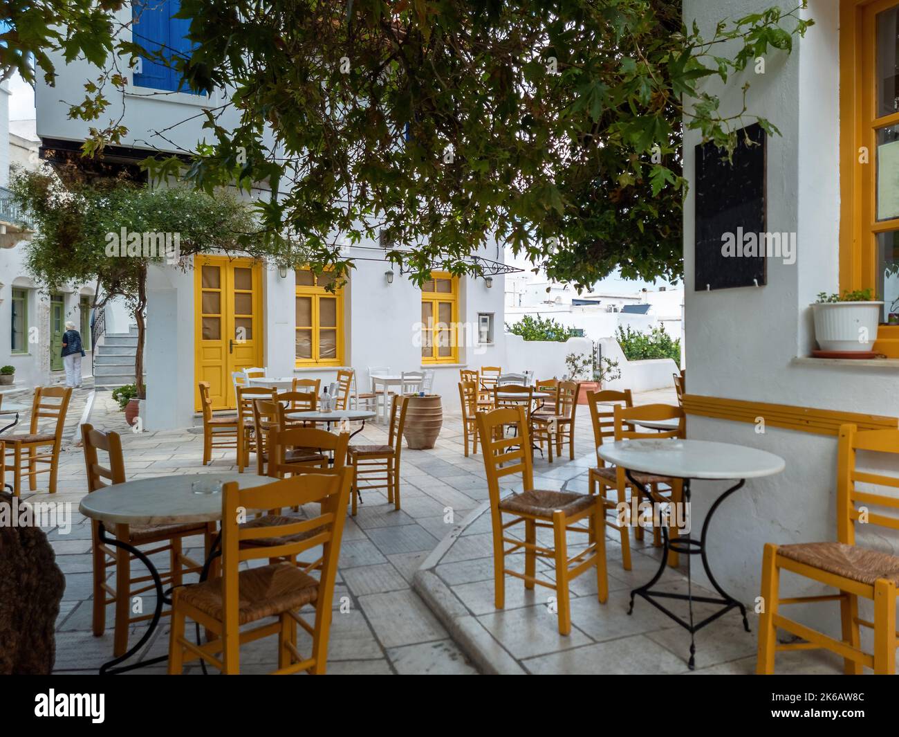 Greek outdoors tavern restaurant at Tinos island, Pyrgos village ...