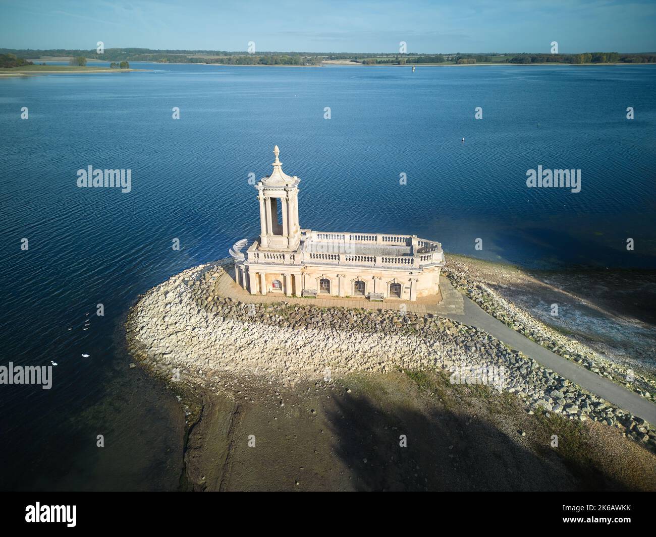 A partially submerged church after a dry summer at the reservoir beside ...