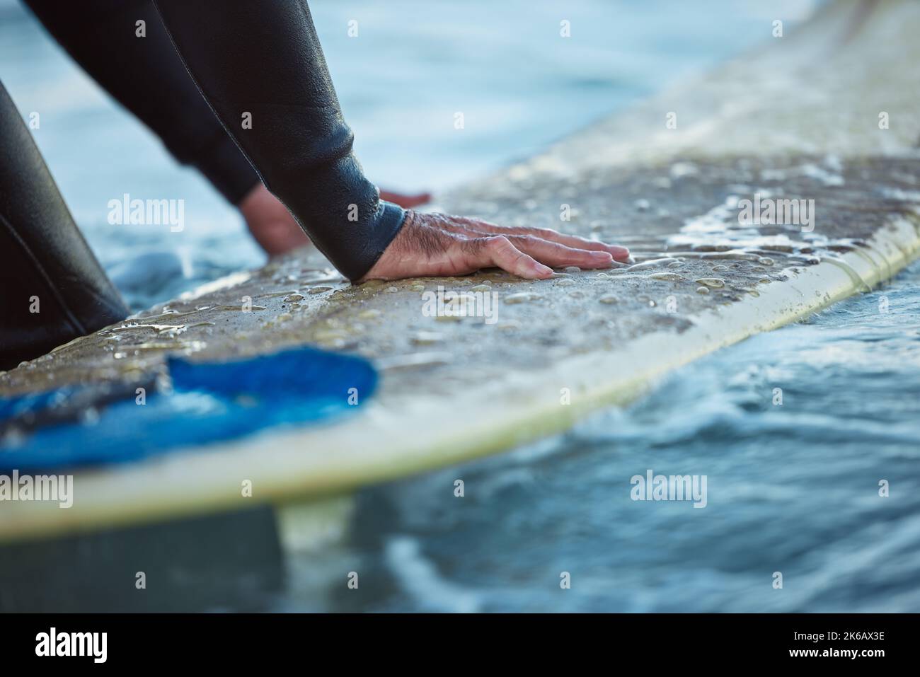 Surf, ocean surfing and hand of man on surfboard in sea water. Summer ...
