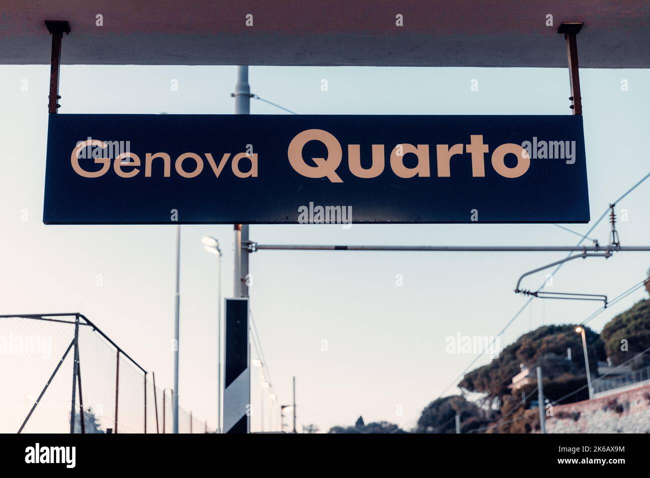 A 'Genova Quarto' sign hanging in station Stock Photo - Alamy