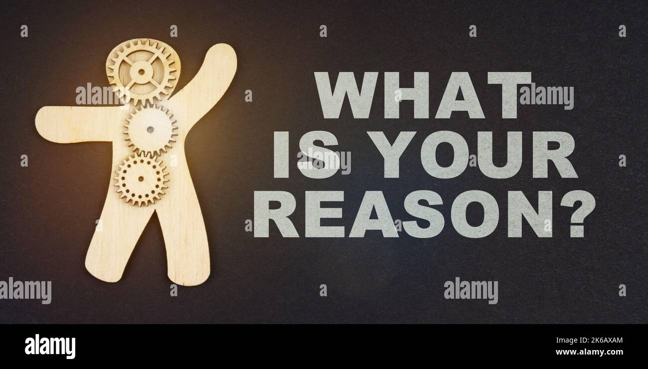 Business concept. On a black background, the figure of a man and gears ...