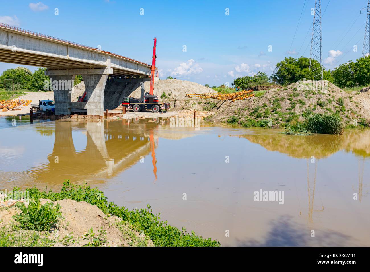 View of the unfinished bridge, road over river is under construction ...
