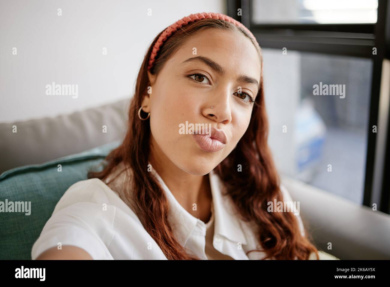 Woman, selfie or kiss face expression in university, college or school ...