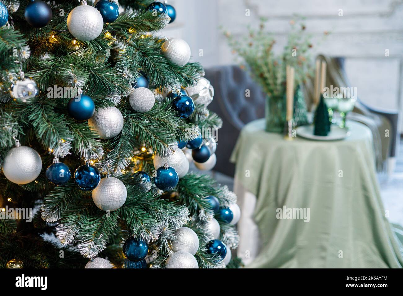 Christmas tree with blue and silver toys. Festively decorated Christmas ...
