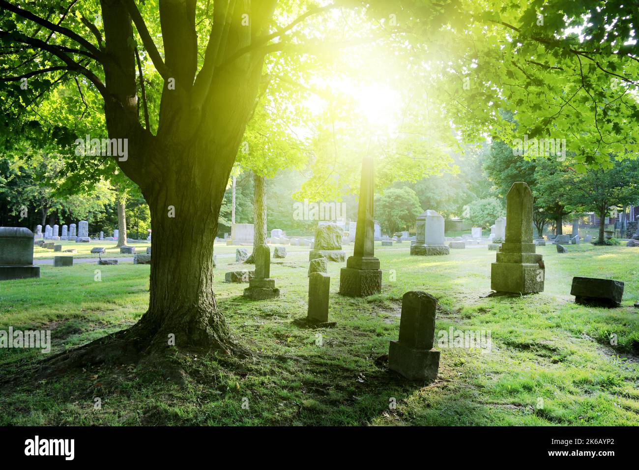 a sunset spiritual cemetery graveyard grave tombstone rural county ...