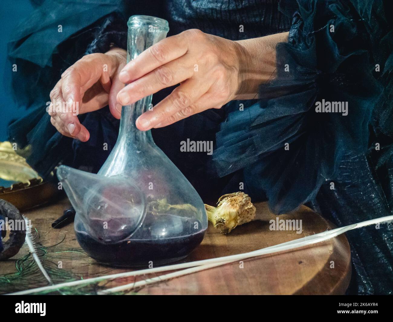witchy preparing poisoned apple for victim as dark evil spell for ...