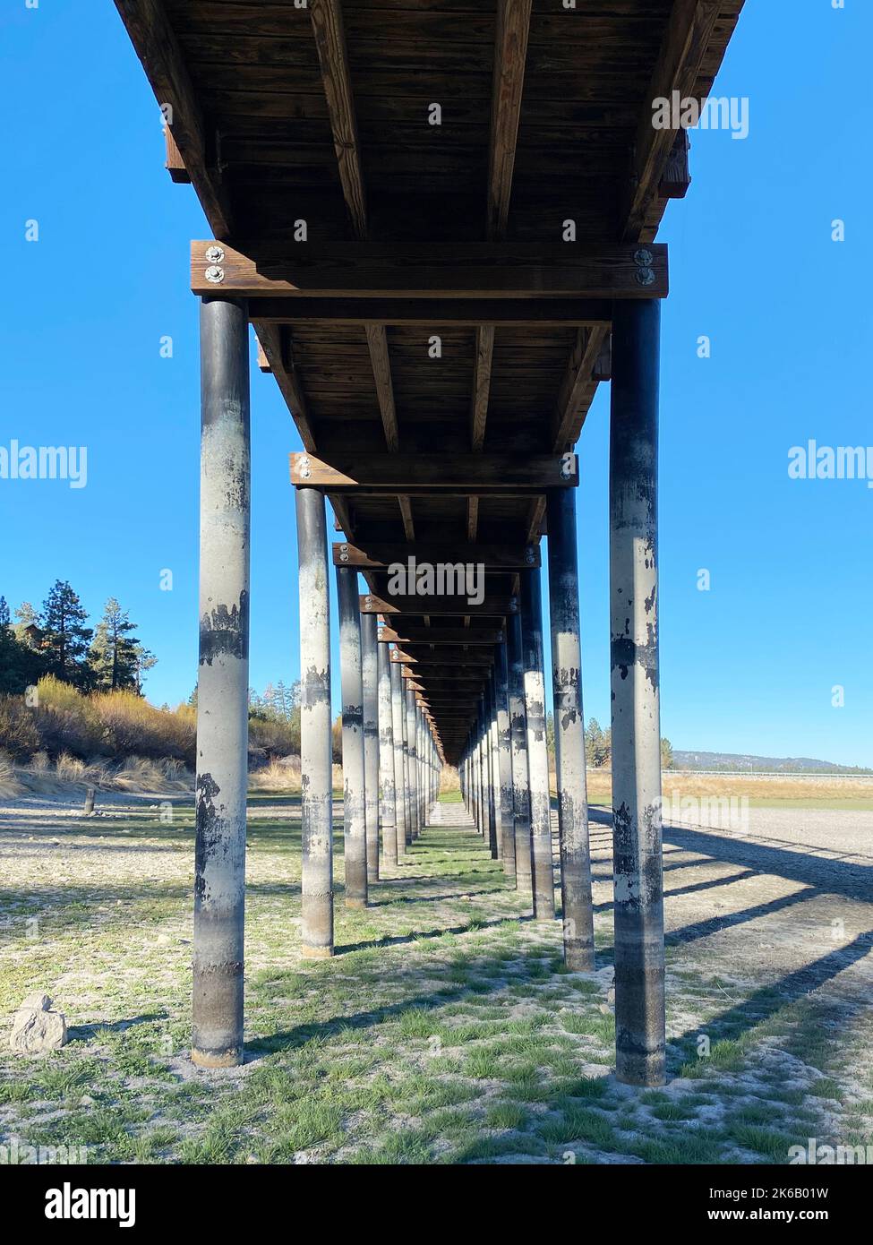 a tall bridge footbridge pedestrian path overcrossing boardwalk dry ...