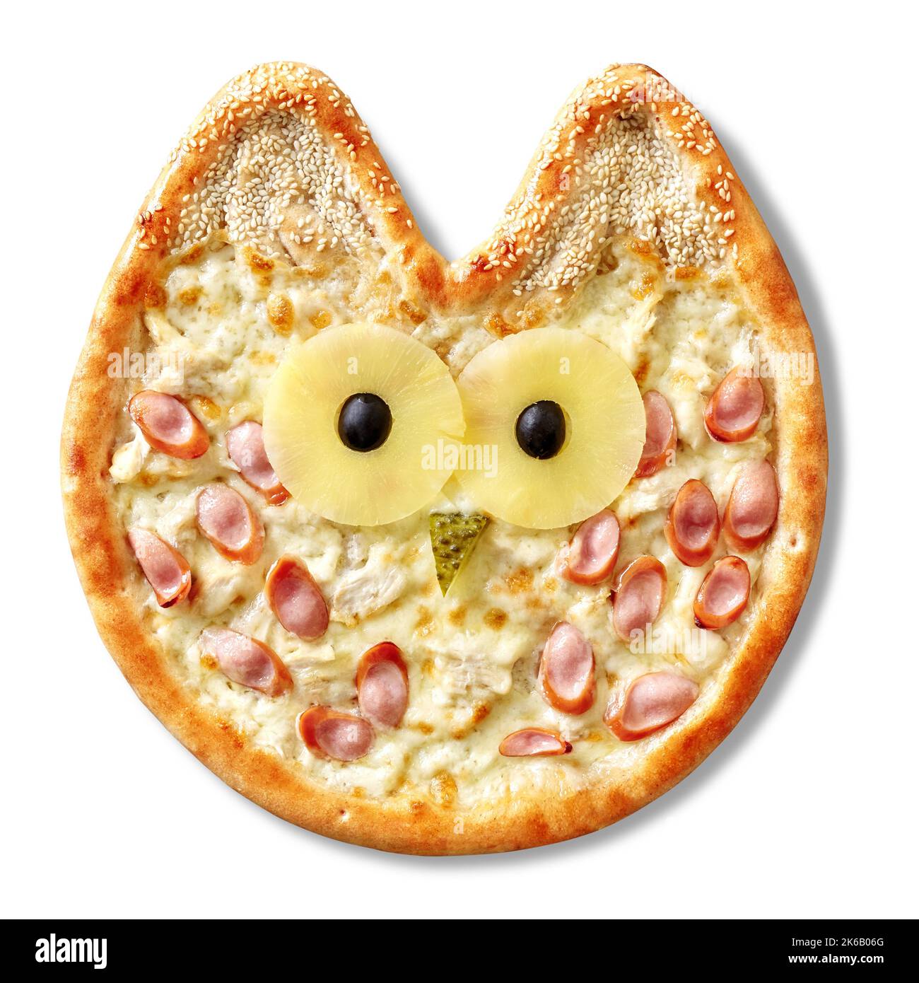Funny owl-shaped pizza with cream cheese sauce, chicken, Vienna sausage ...