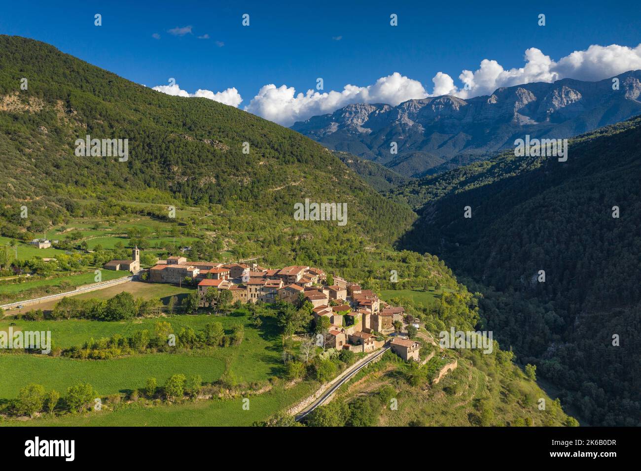 Aerial view of the village of Arsèguel on a summer afternoon. In the ...