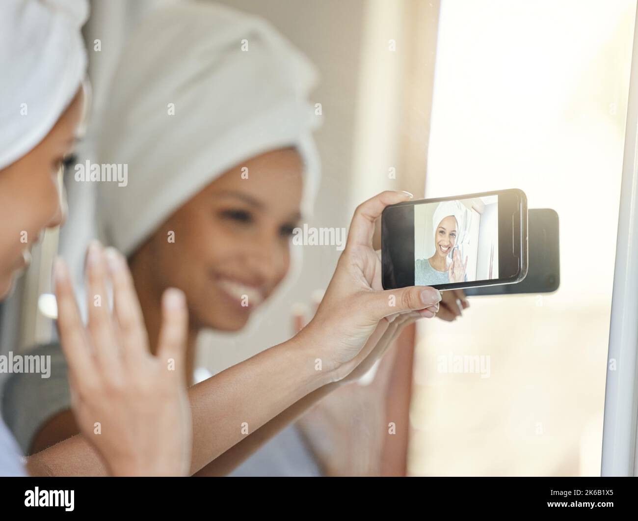 Just wanted to say hi. a young woman recording herself getting ready at ... Just wanted to say hi. a young woman recording herself getting ready at ...