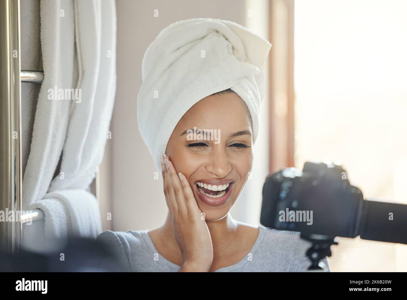 Follow me around my day. a young woman recording herself getting ready ...