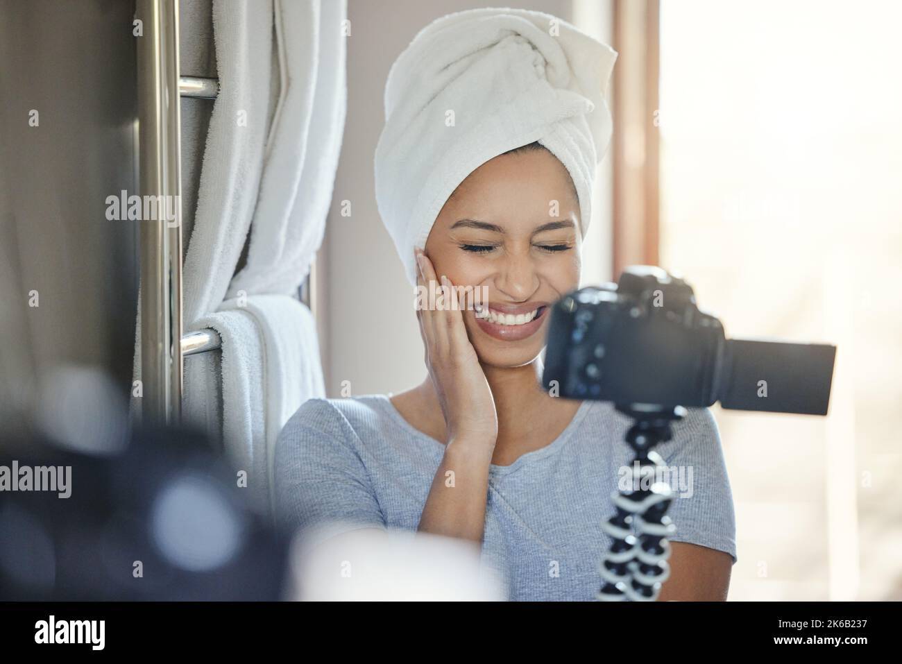 Im so excited. a young woman recording herself getting ready at home ...